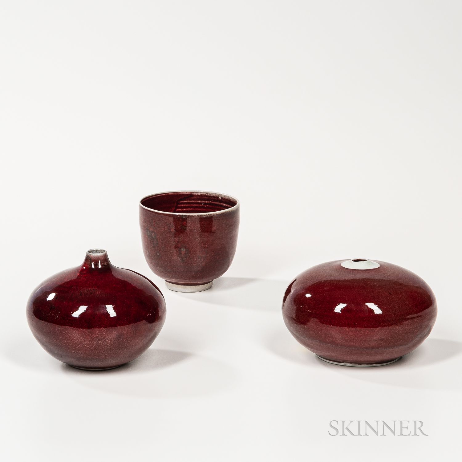 Sold at auction Three Gerry Williams (1926-2014) Studio Pottery Red ...